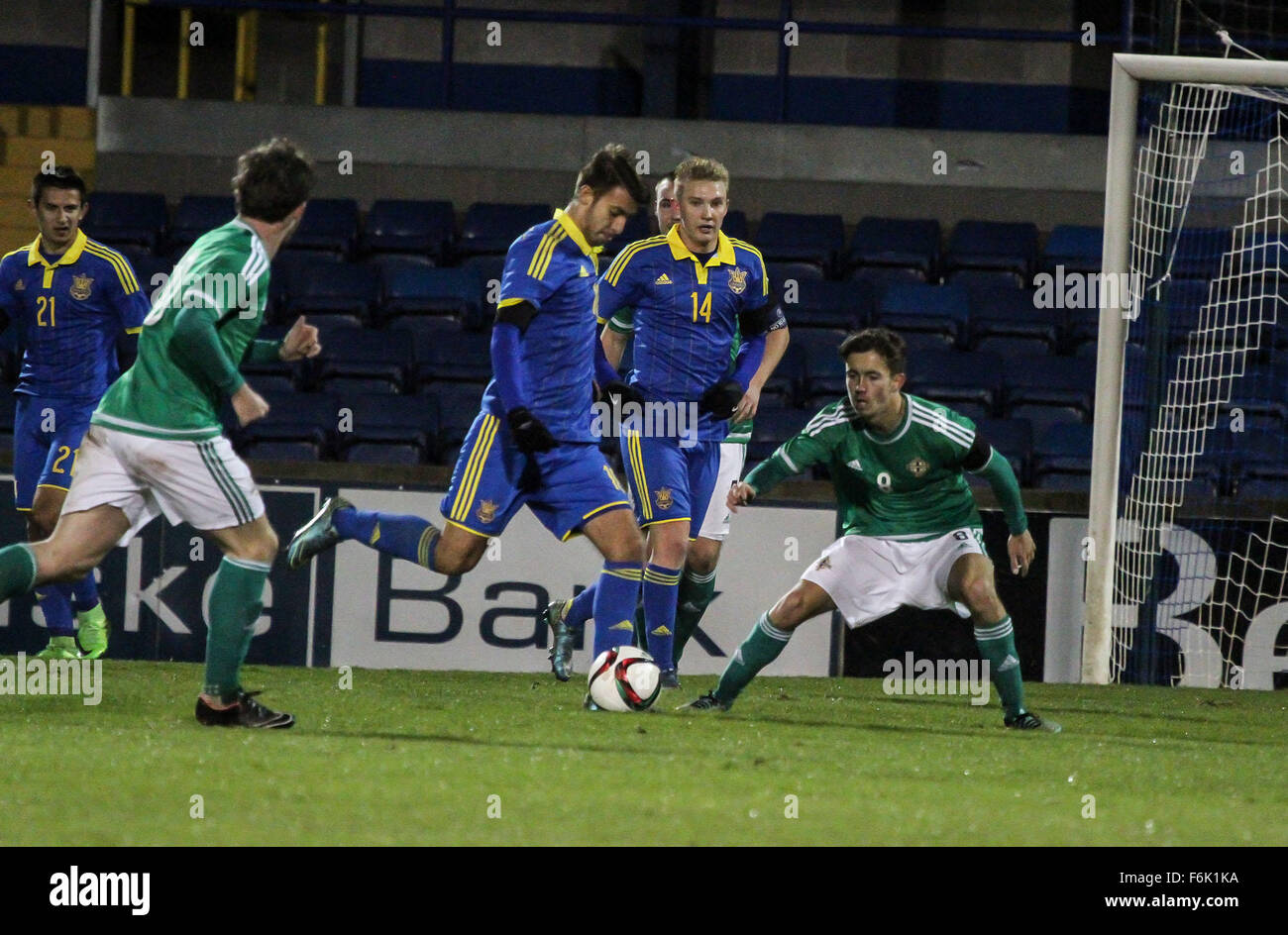 Lurgan, UK. 17th November 2015. Ukraine's Vladlen Yurchenko (blue, 10 ...