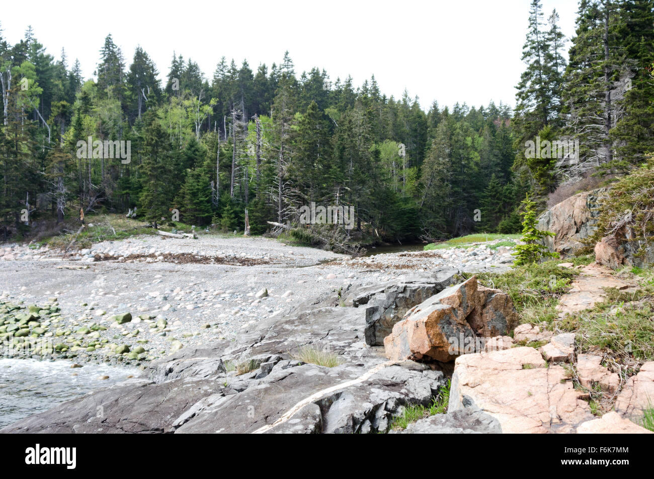 View of Hunters Beach from the cliffs in early spring, Acadia National ...