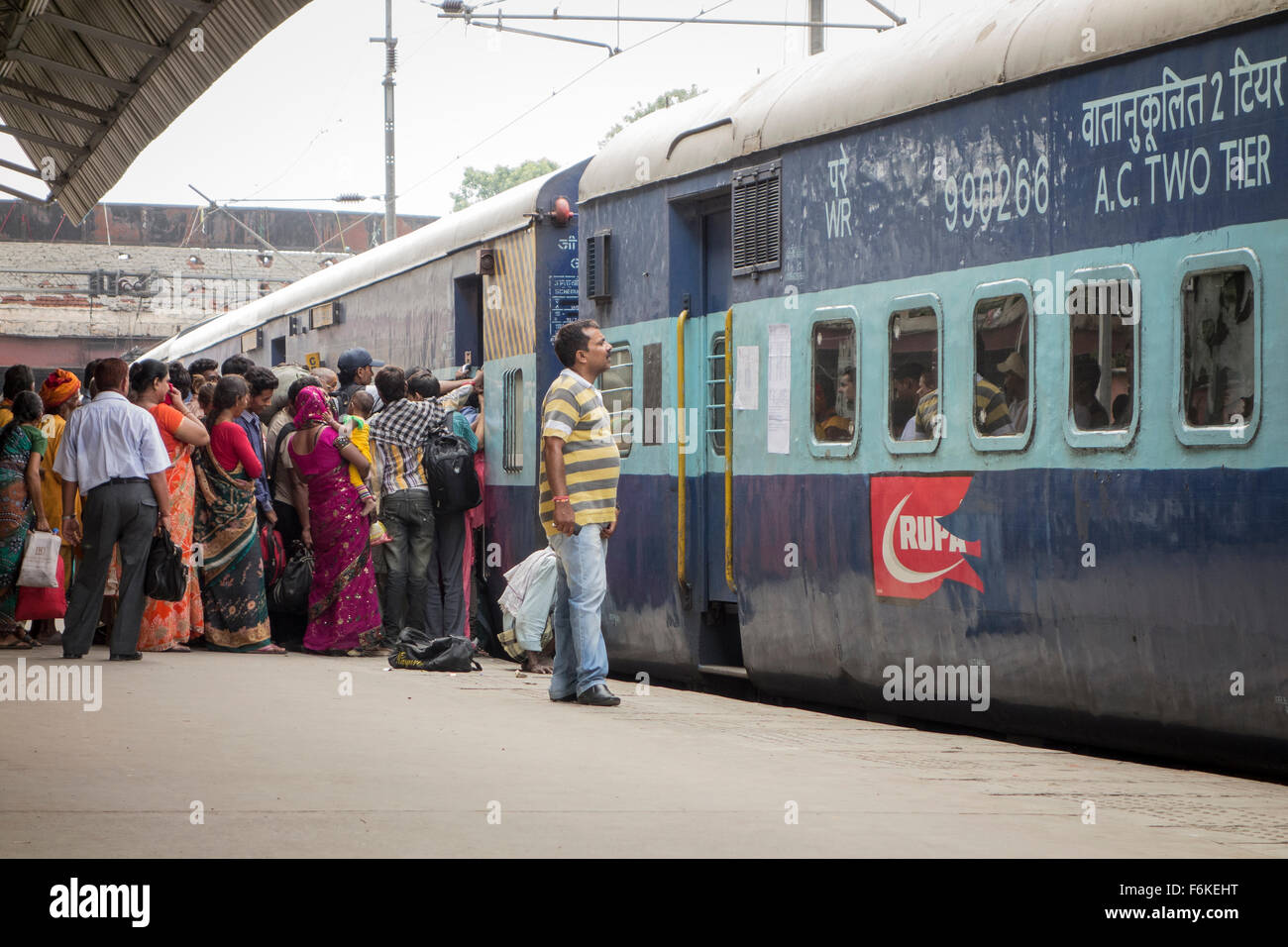 Line pushing shoving train hi-res stock photography and images - Alamy