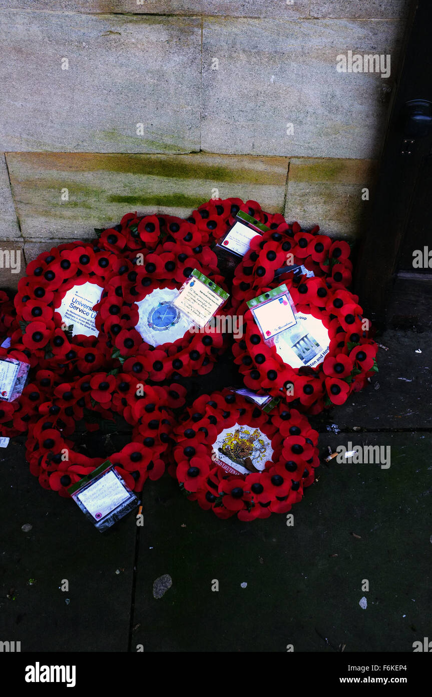A pile of poppy wreaths in a pile on the ground in Brighton Stock Photo ...