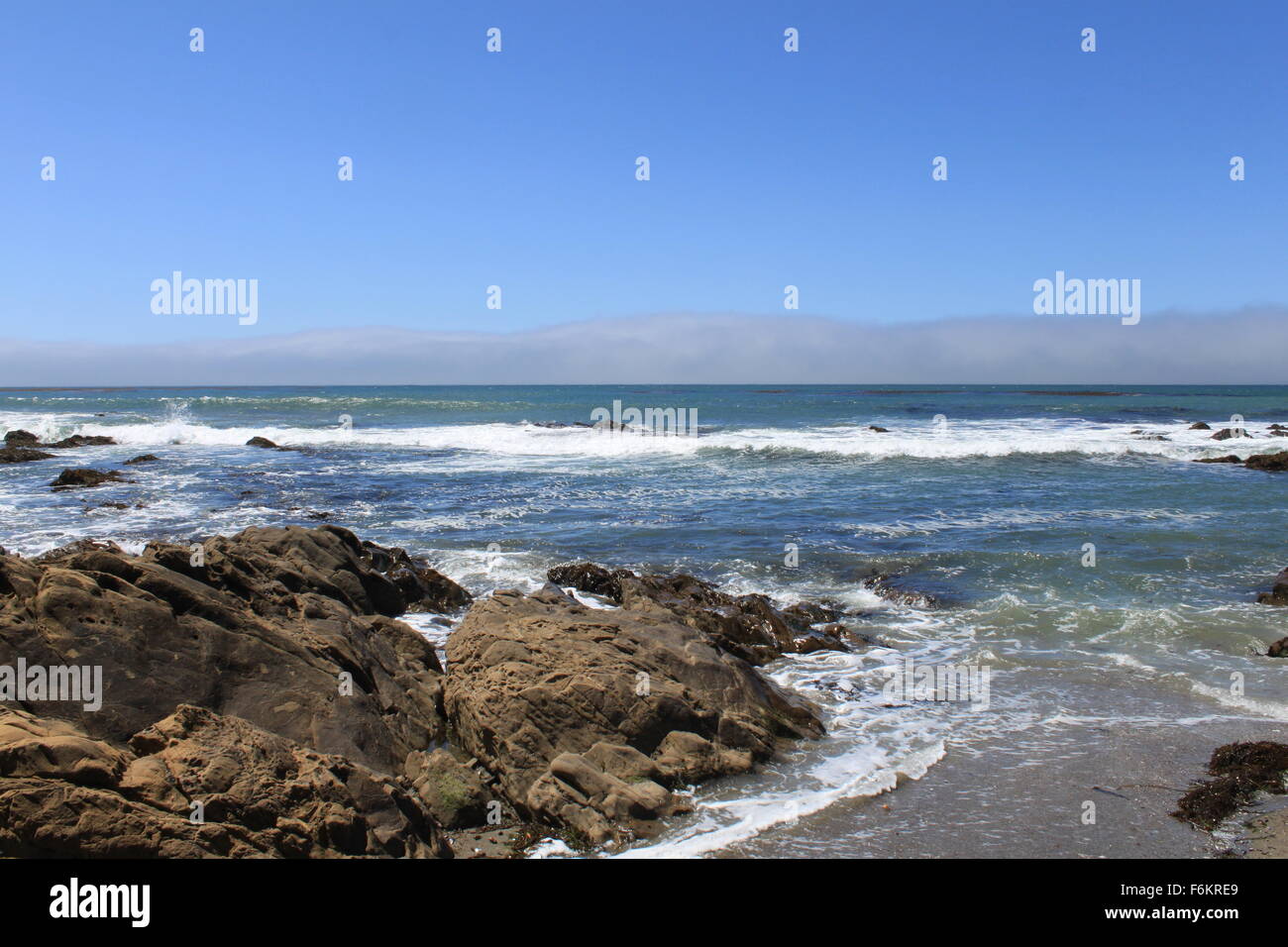 Waves beating shore on beach hi-res stock photography and images - Alamy