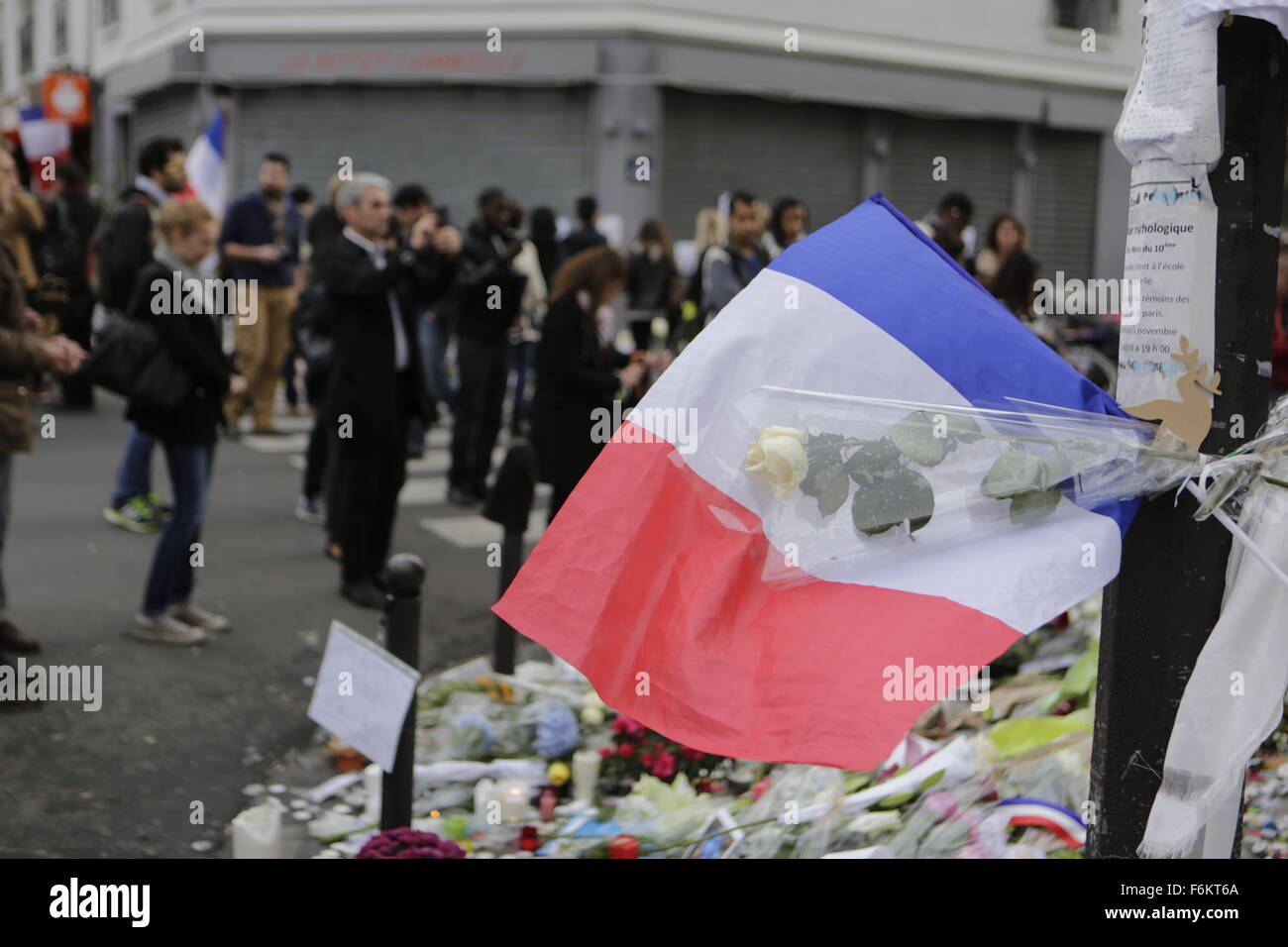 Paris, France. 17th November 2015. A french flag flies at the memorial ...