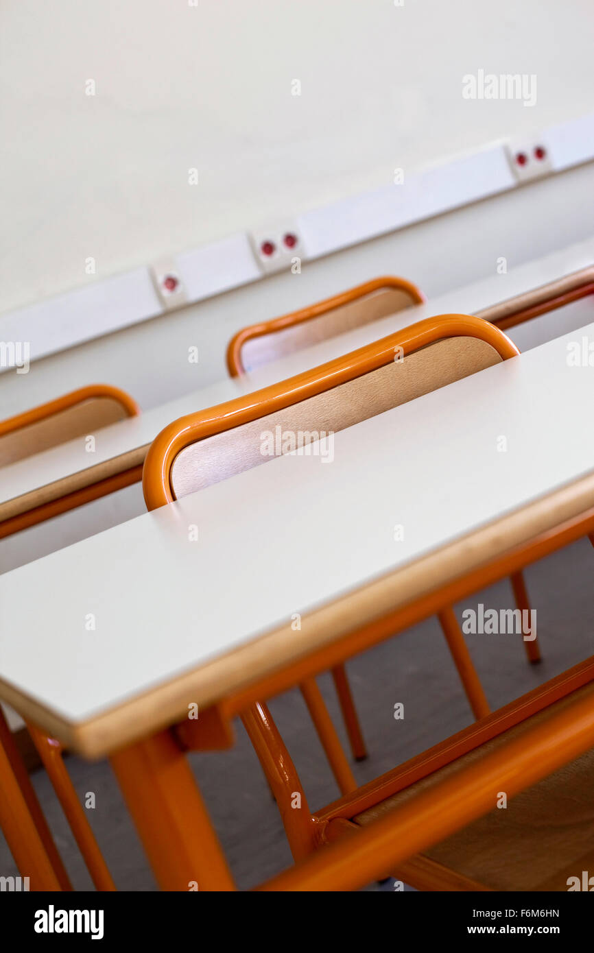 Close up of chairs in a classroom at university Stock Photo - Alamy