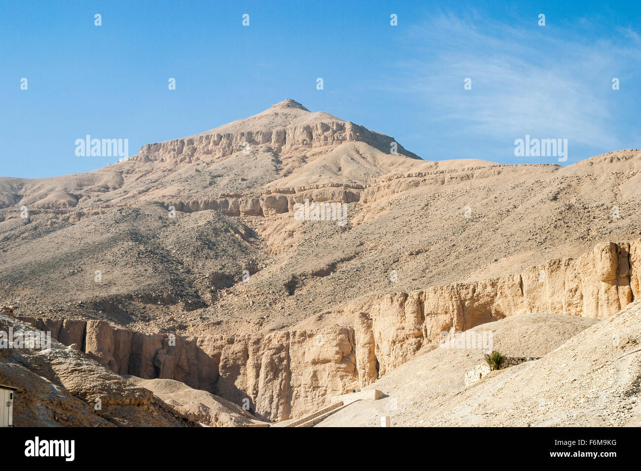 Arid pyramid-shaped mountain at the head of the Valley of the Kings ...