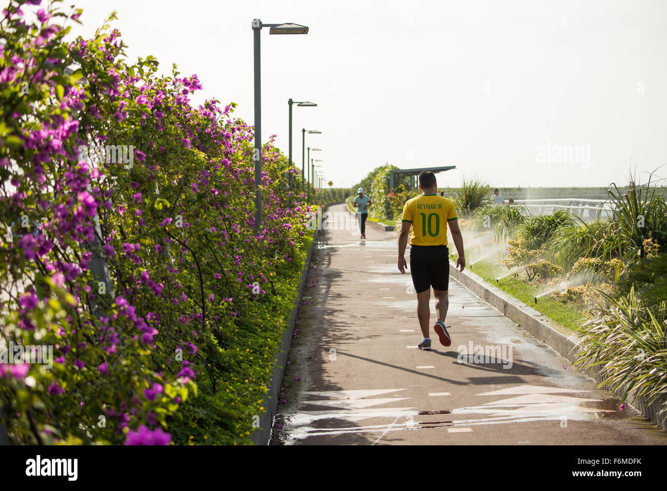 PANAMA CITY, Panama — People stroll along the Cinta Costera III ...