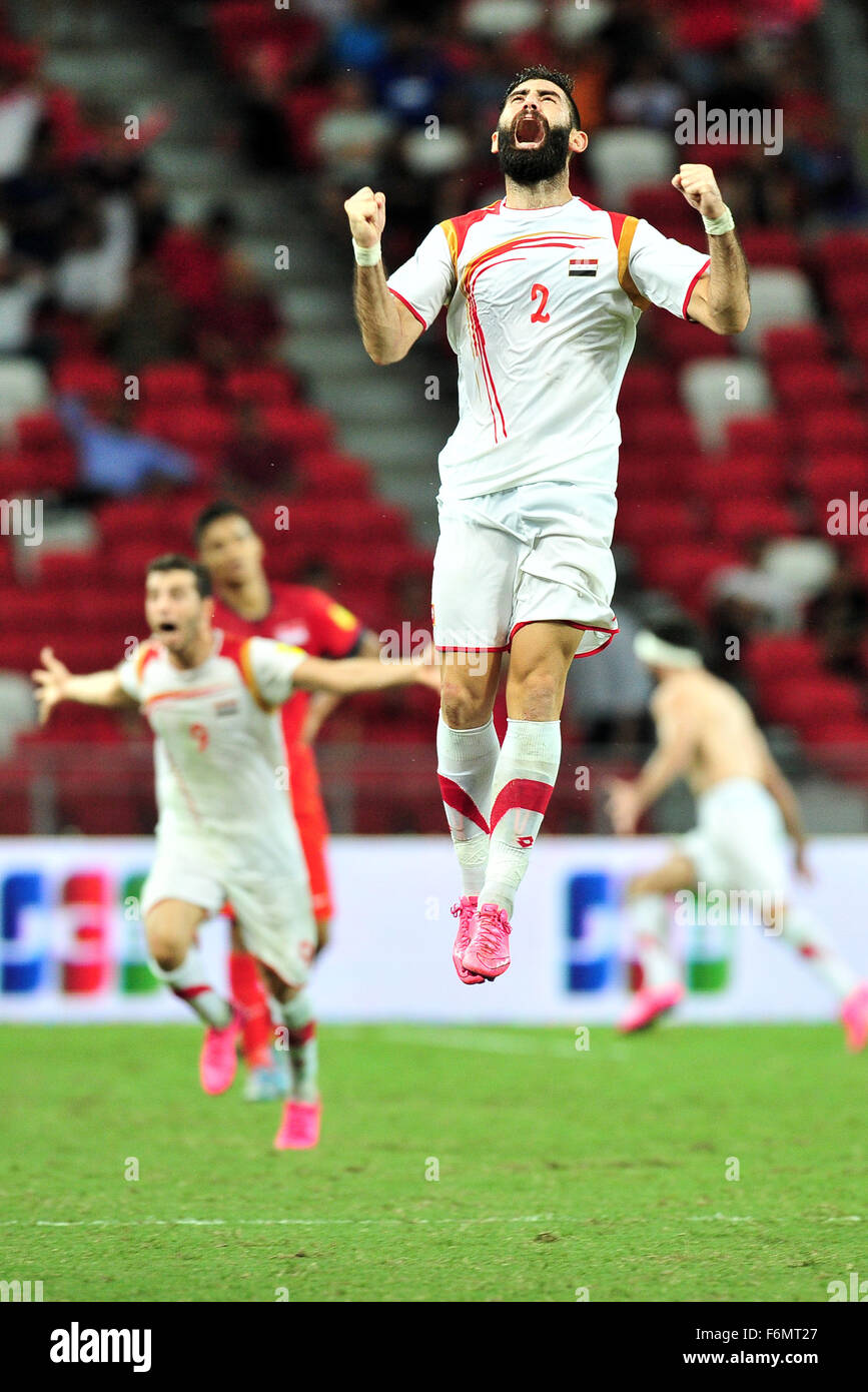 Singapore. 17th Nov, 2015. Players of Syria celebrate scoring during a ...