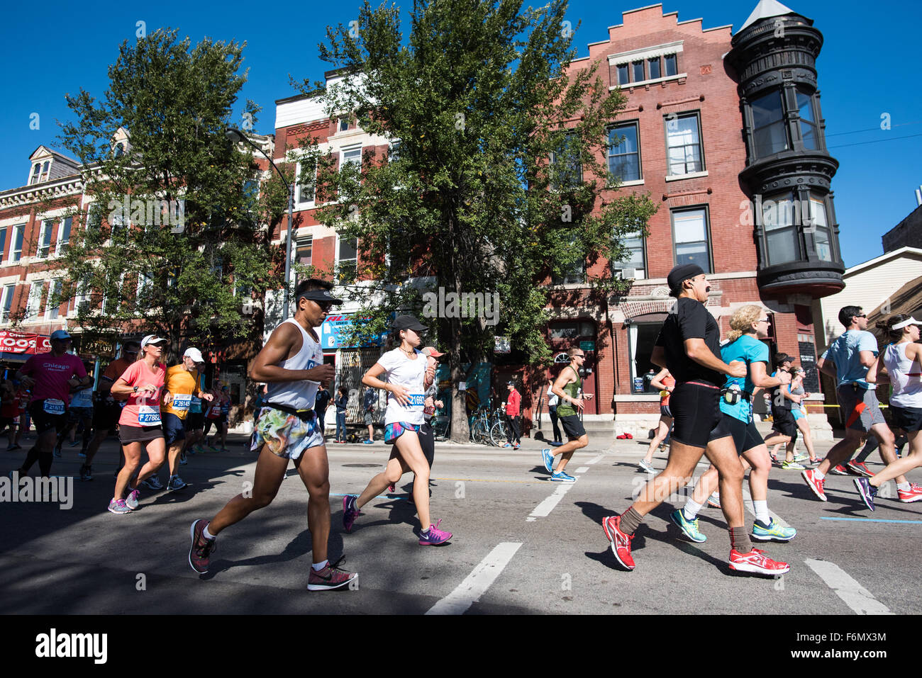 Participants in the Bank of America Chicago Marathon run down 18th ...