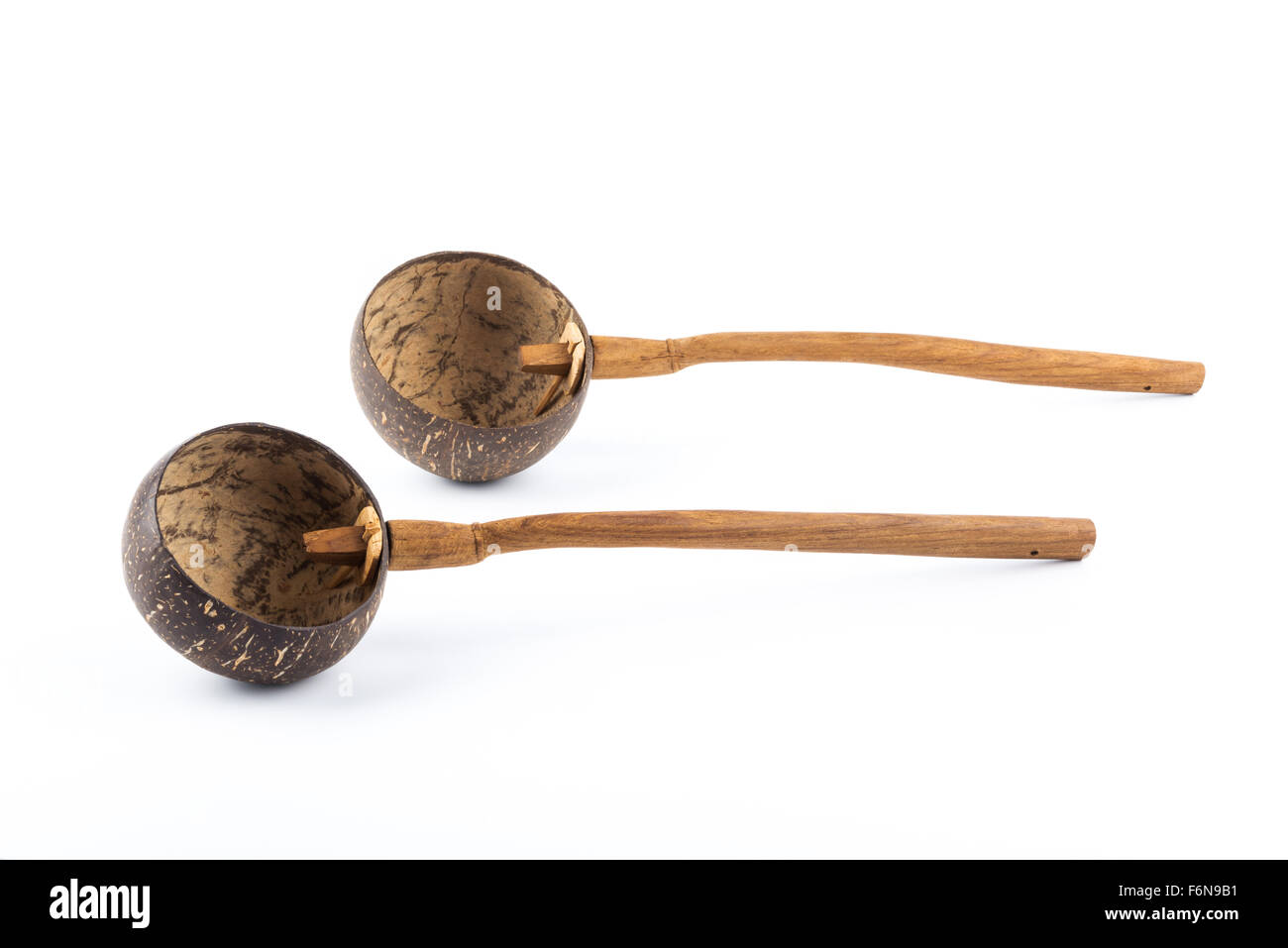 2 coconut shell ladle on white background Stock Photo - Alamy