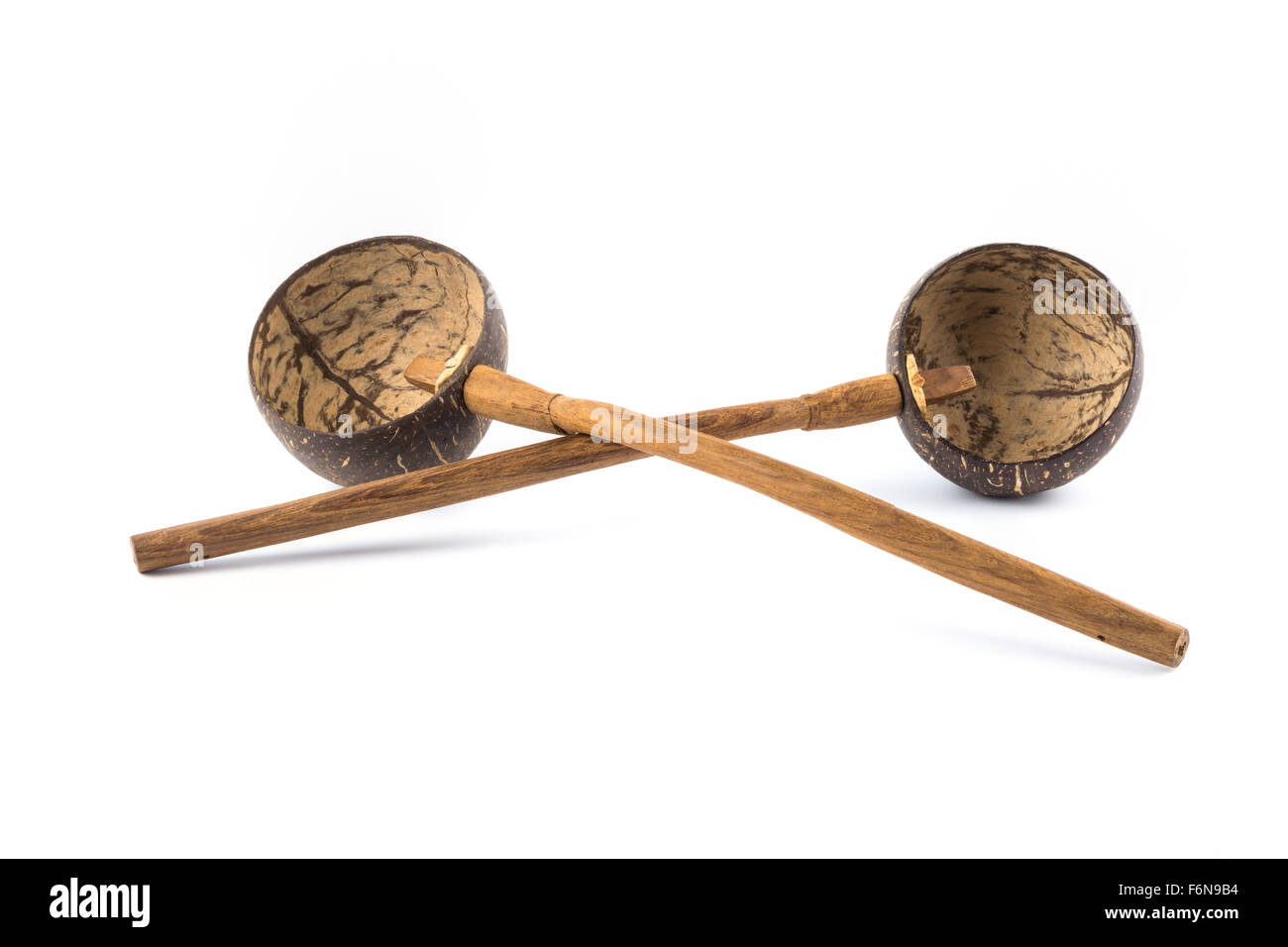2 coconut shell ladle on white background Stock Photo - Alamy