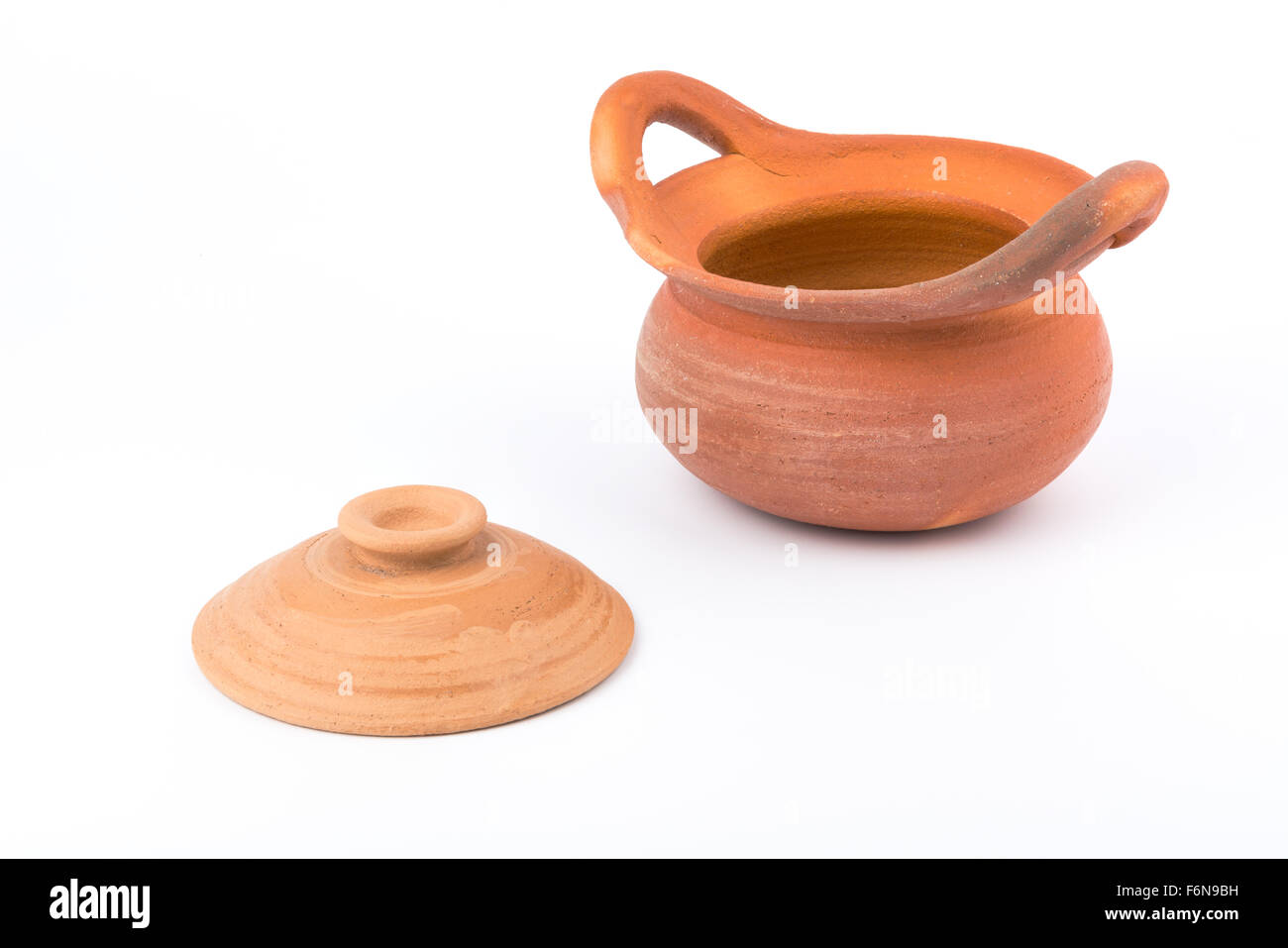 Clay pots are open on white background Stock Photo - Alamy