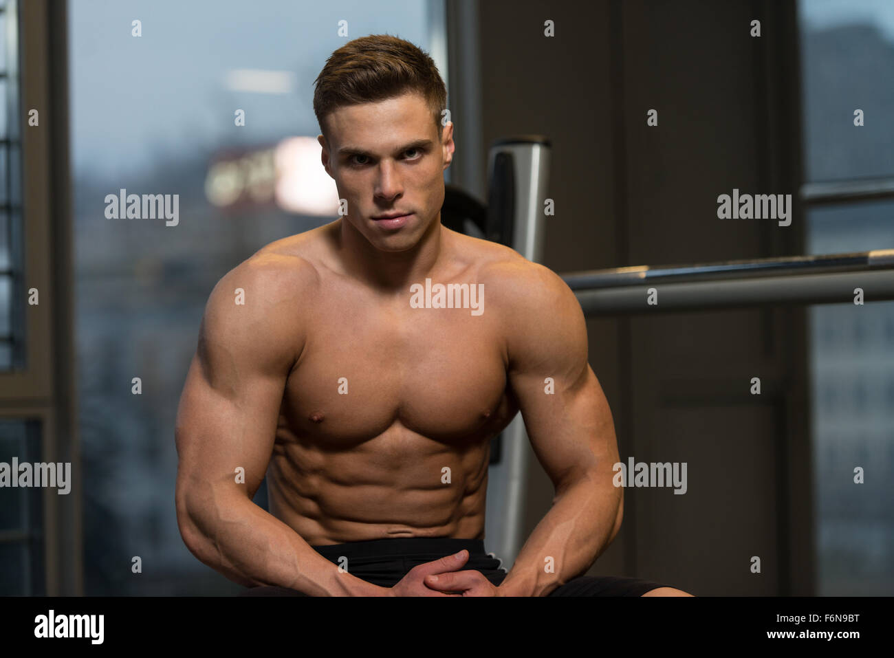 Good Looking And Attractive Young Man With Muscular Body Relaxing In ...
