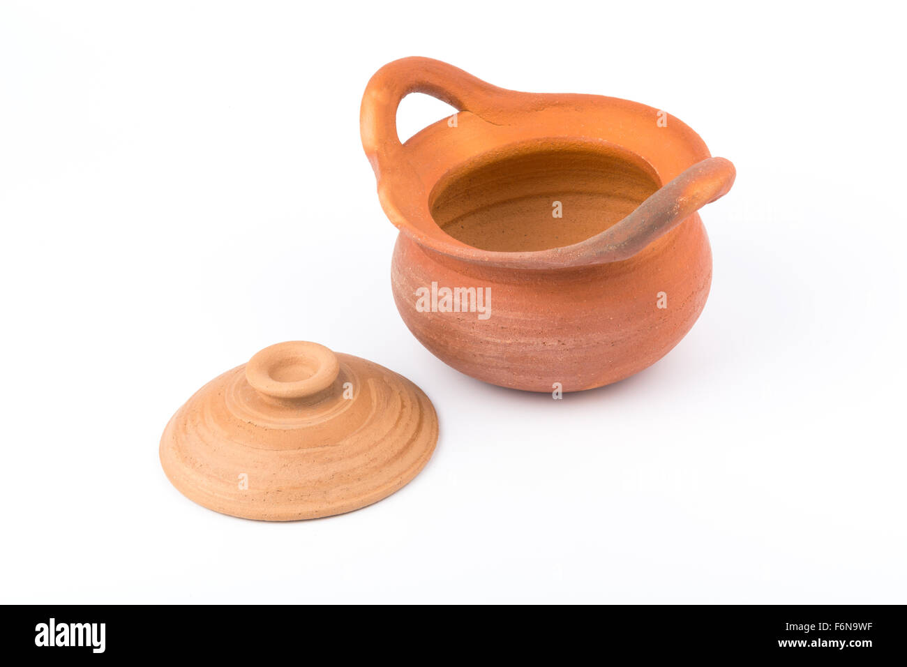 Clay pots are open on white background Stock Photo - Alamy
