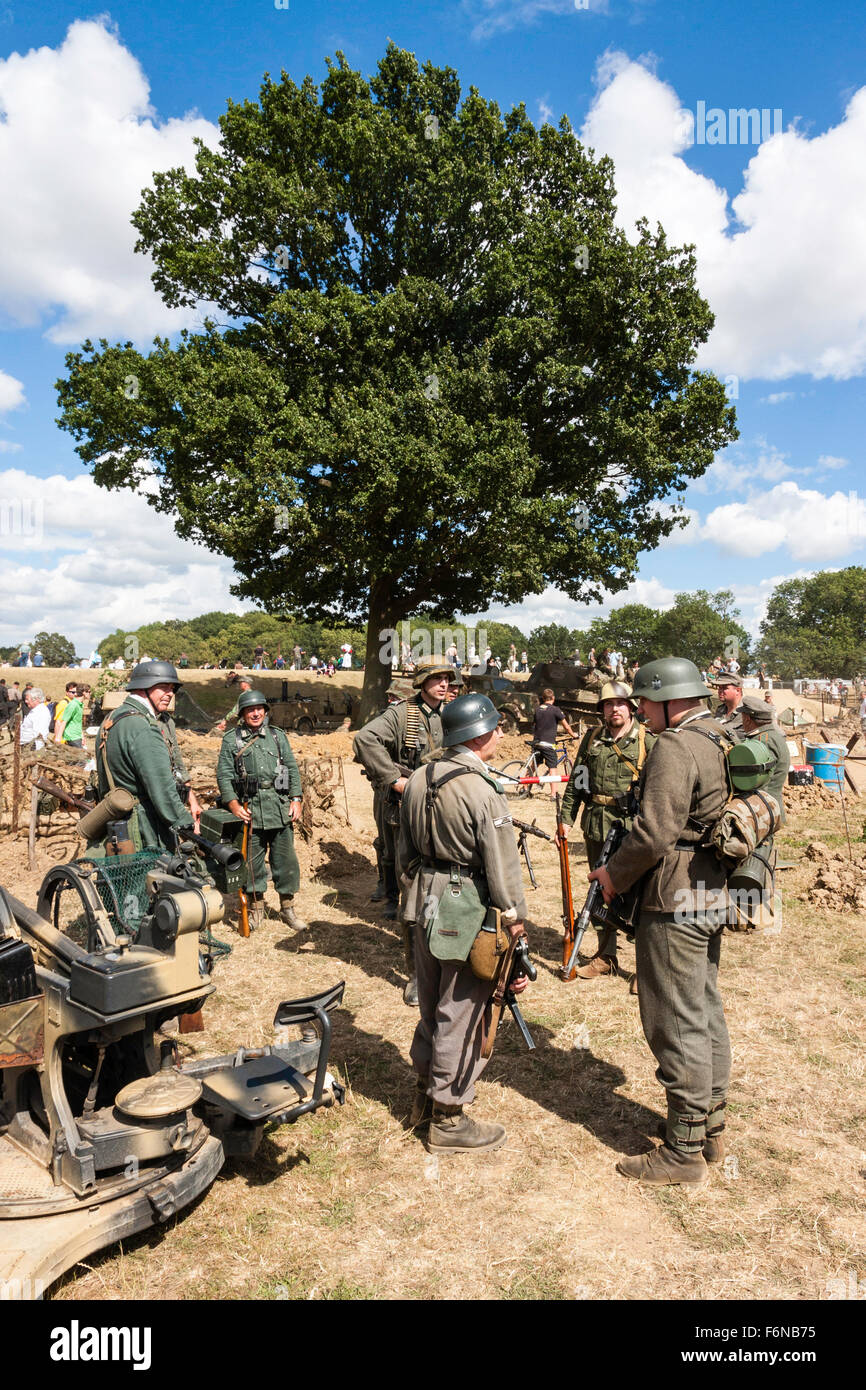 Second world war re-enactment. German soldiers in various uniform ...