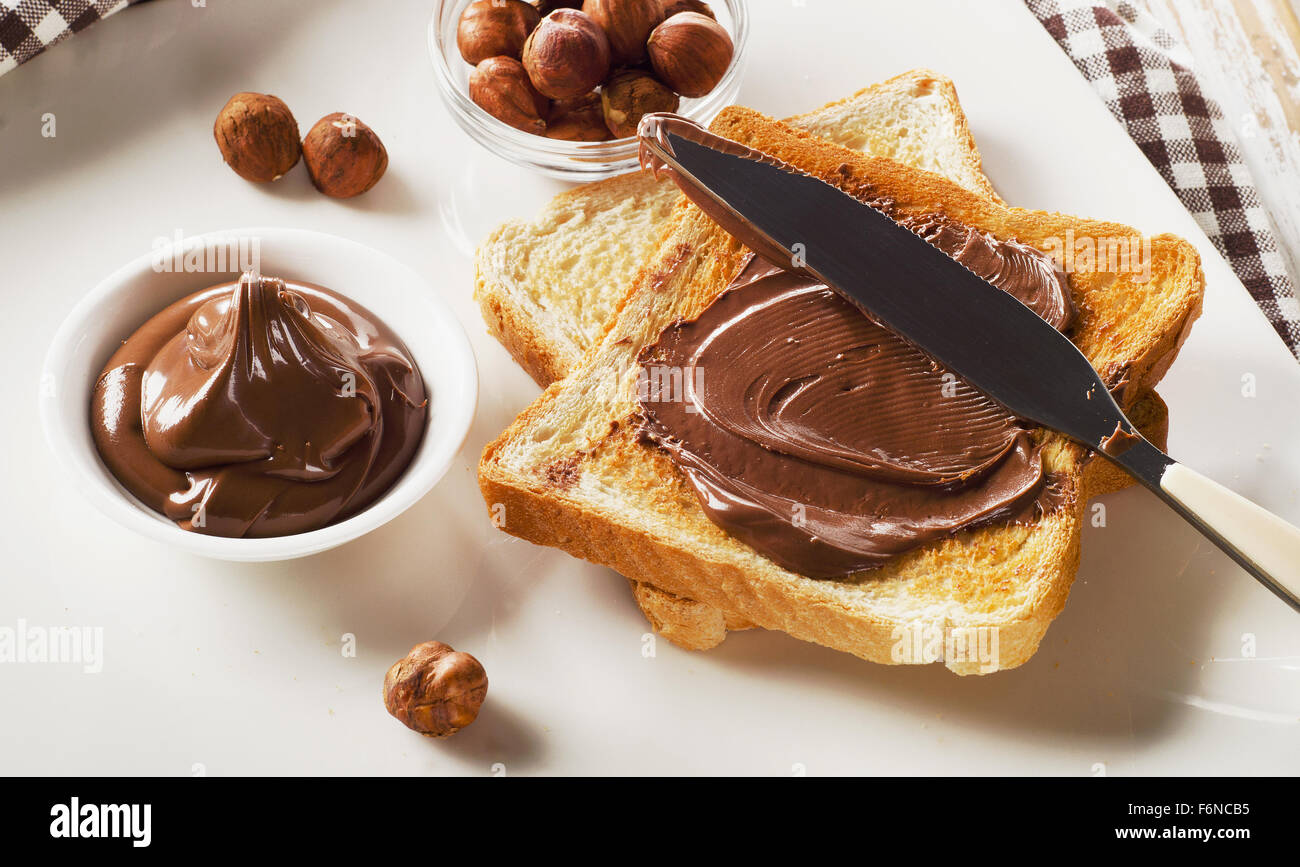 Toast with chocolate spread for a sweet breakfast Stock Photo - Alamy