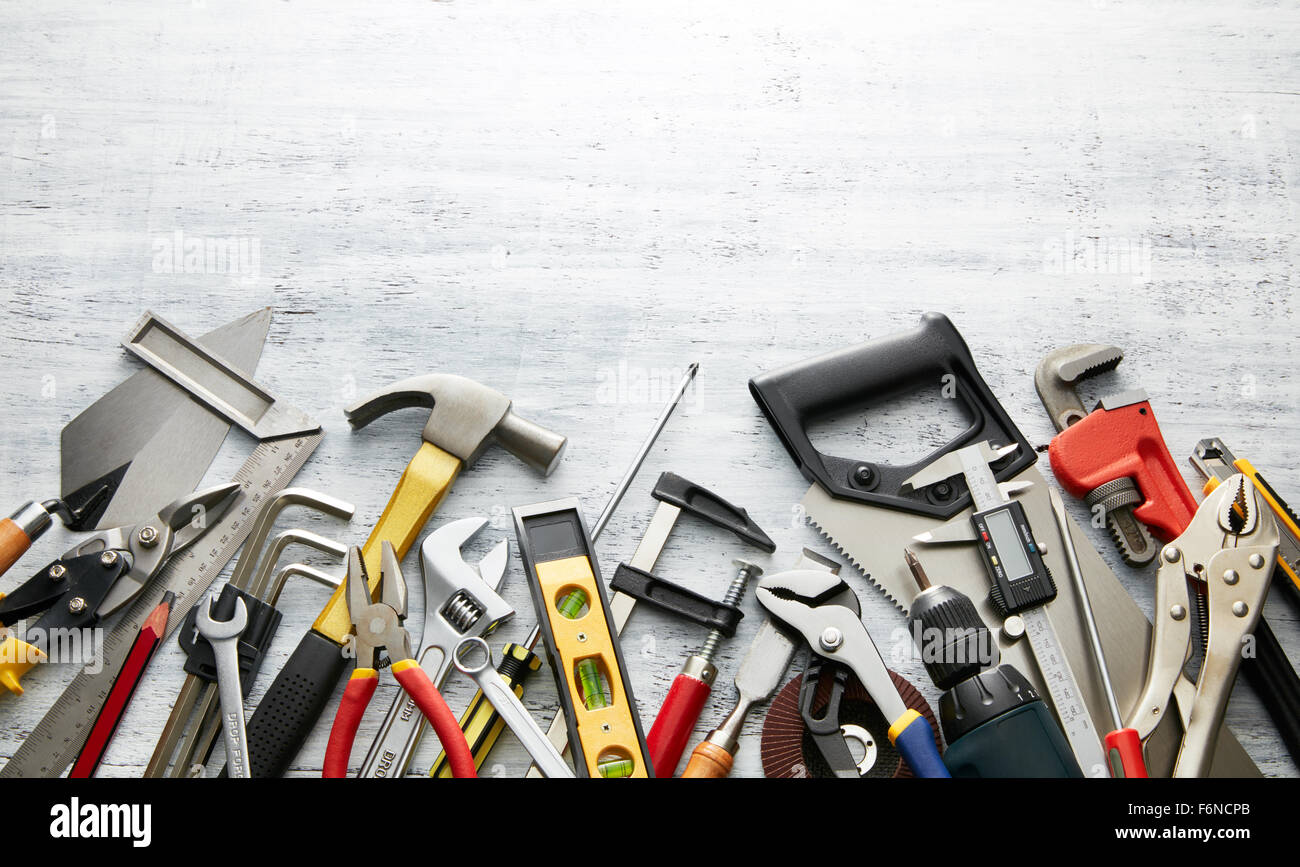 variety of tools on white textured background with copy space Stock ...