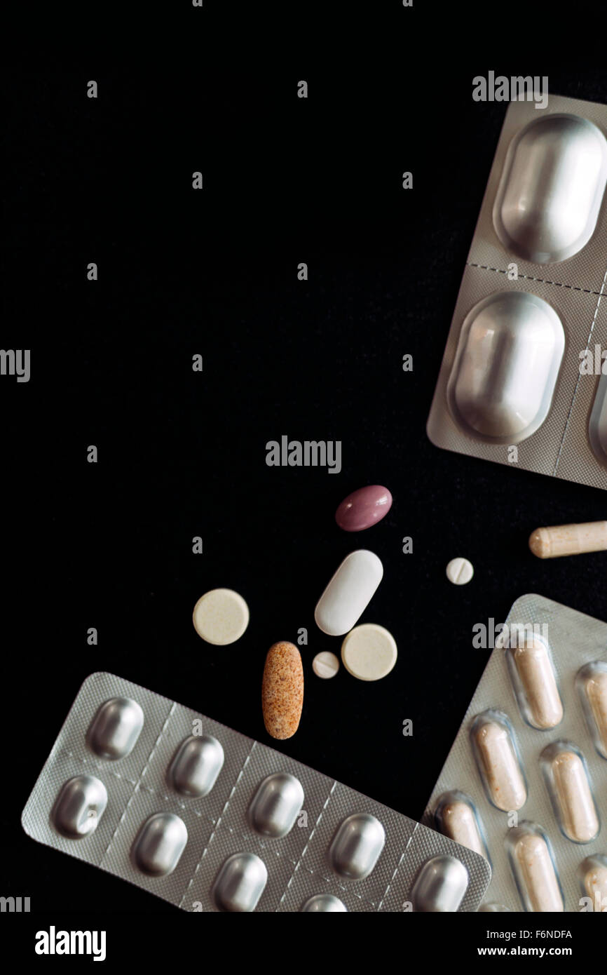 Antibiotics and medication on a dark background Stock Photo - Alamy