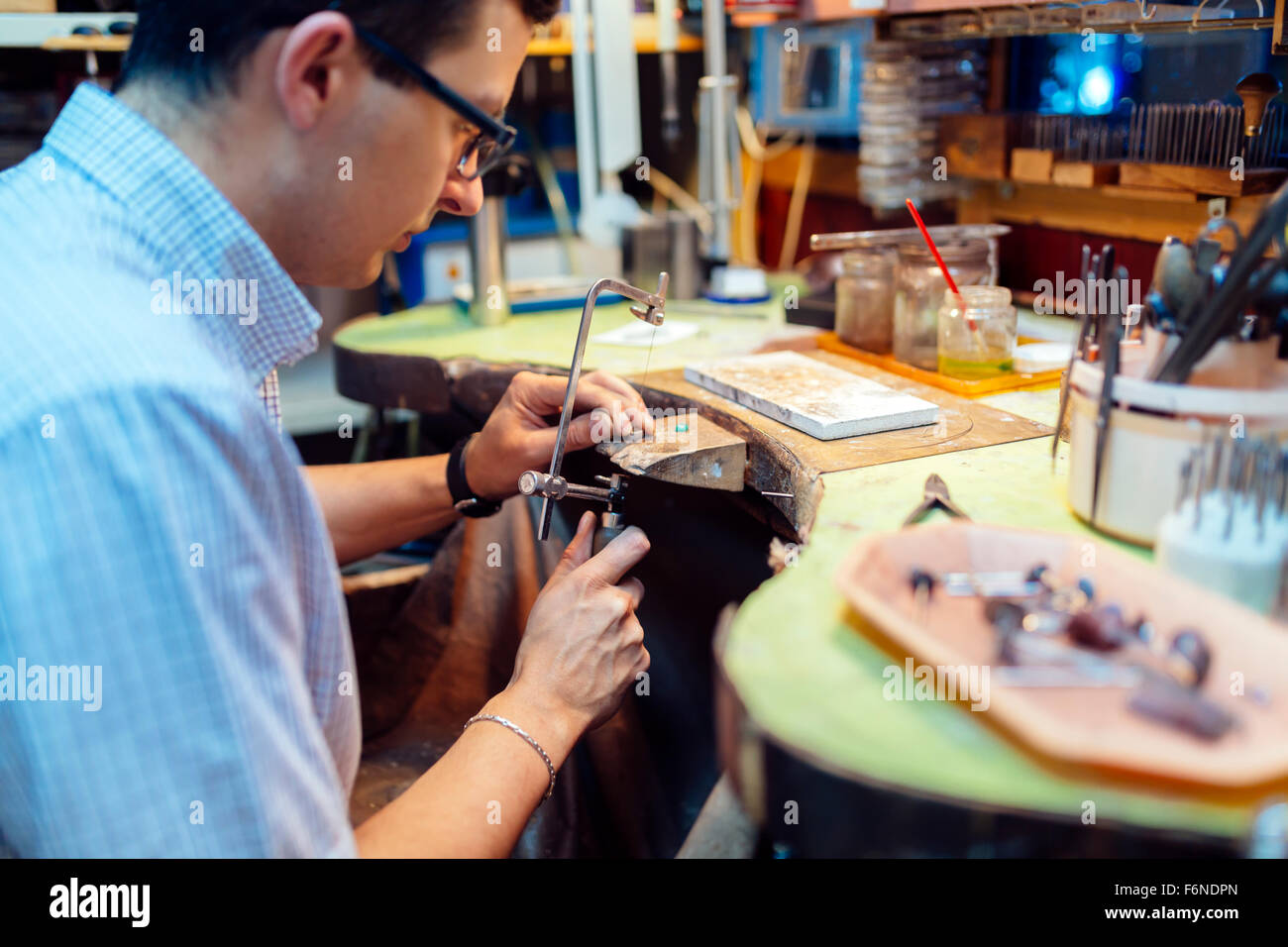 Hand holding expensive gold jewelry hi-res stock photography and images ...