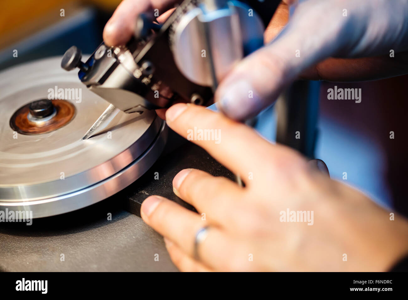 Precise sharpening with whet Stock Photo - Alamy