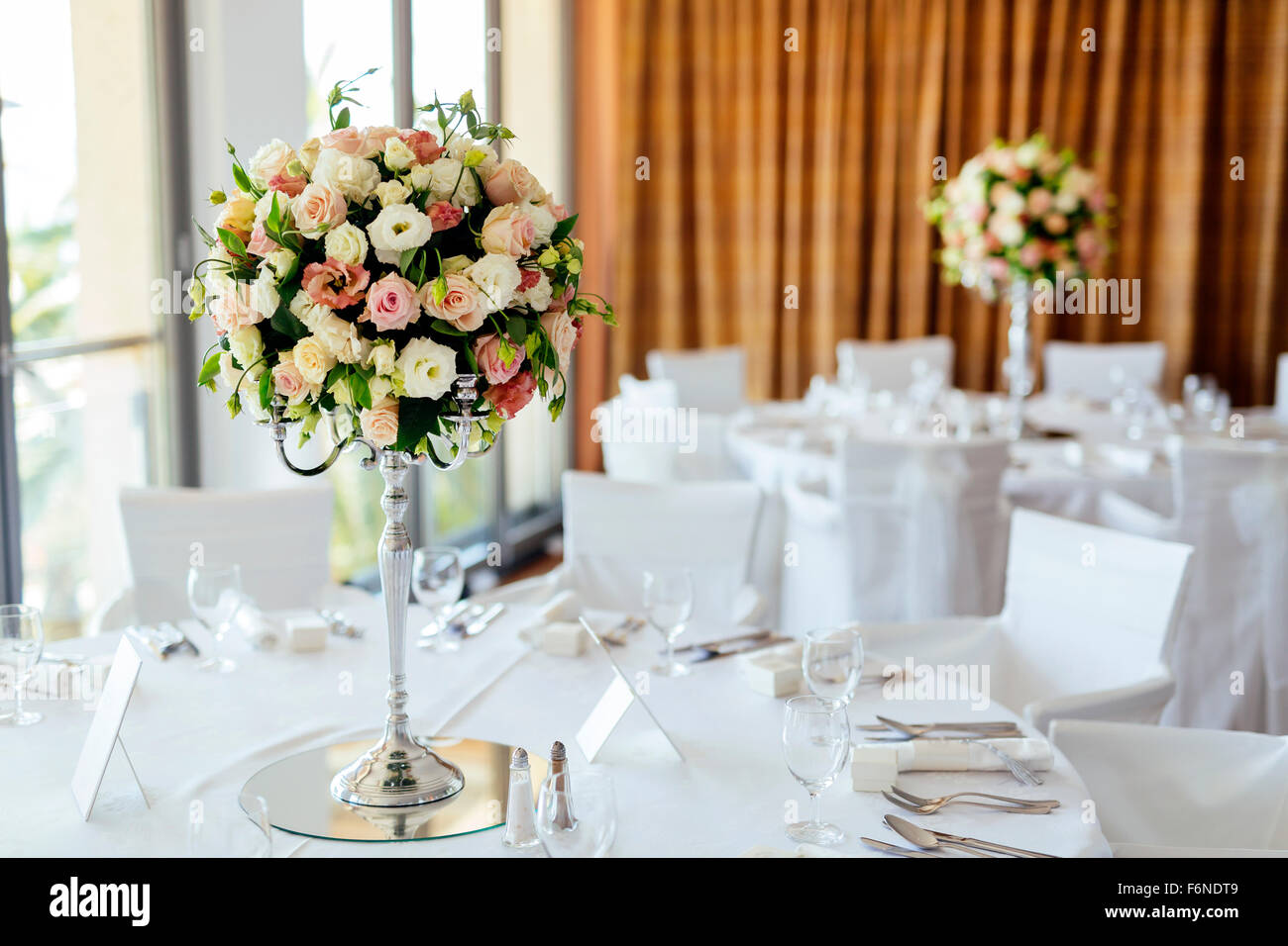 Wedding decoration tables in restaurant hi-res stock photography and ...