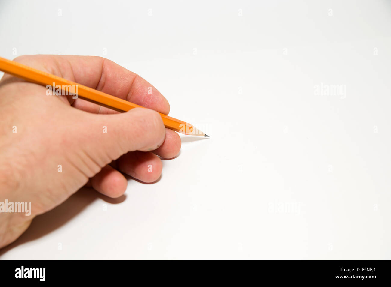 Left Hand Holding A Pencil