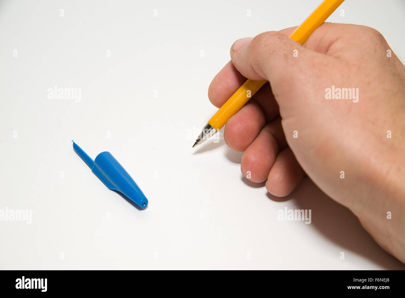 Left Hand Holding Pencil