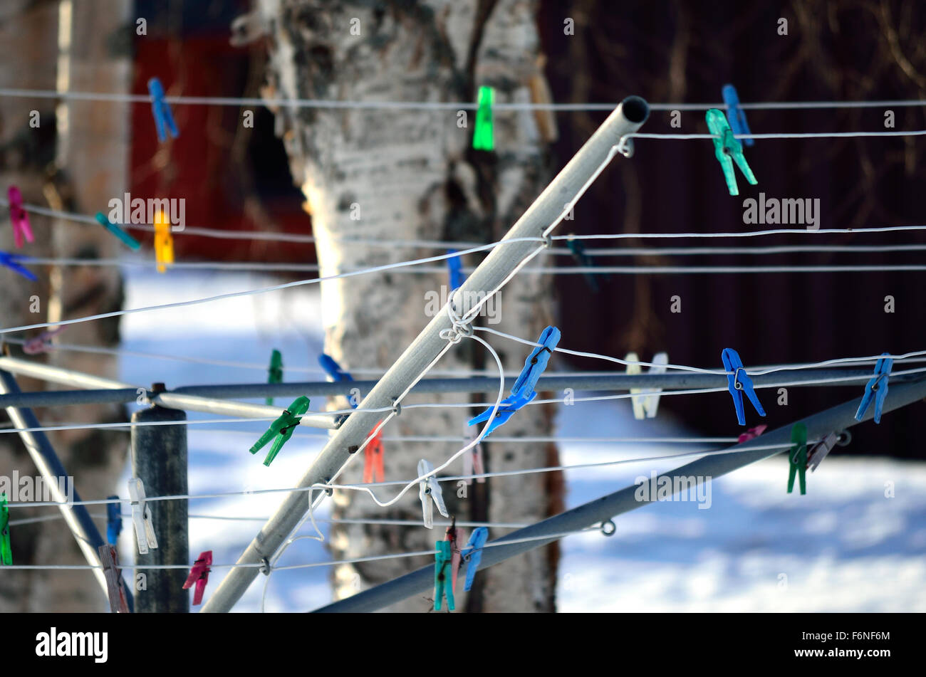 clothes pins on clothes rack Stock Photo - Alamy