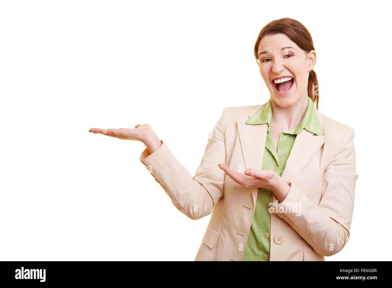 Happy businesswoman pointing to the left side Stock Photo - Alamy