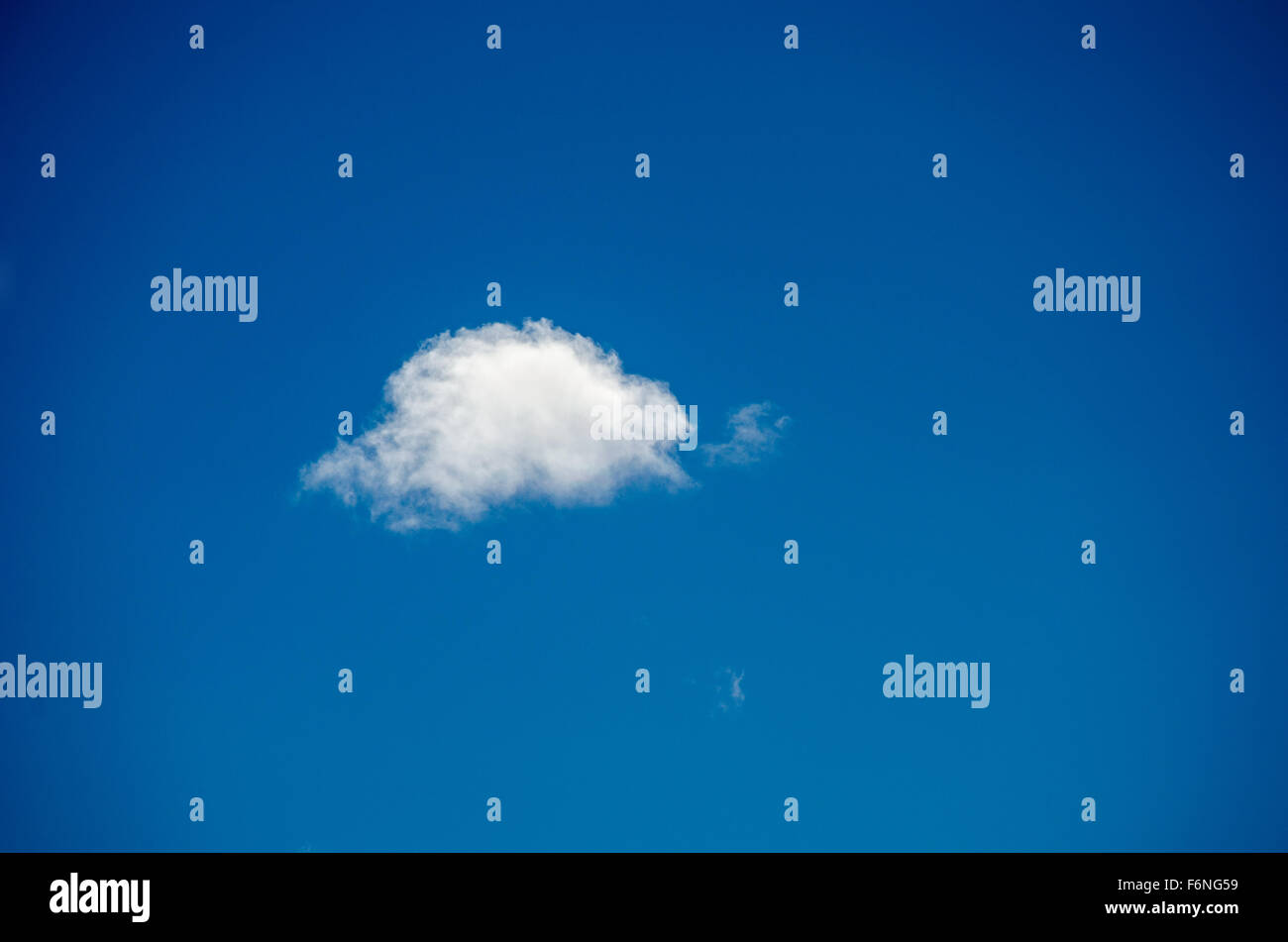 single white cloud on bright blue summer sky Stock Photo - Alamy