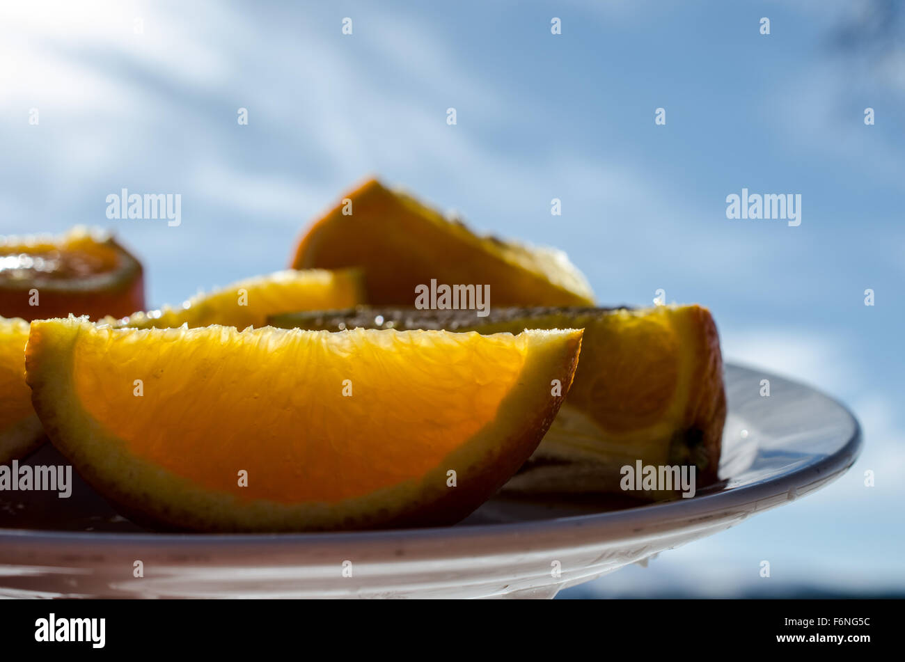 sweet yellow orange slices in easter sunshine Stock Photo - Alamy