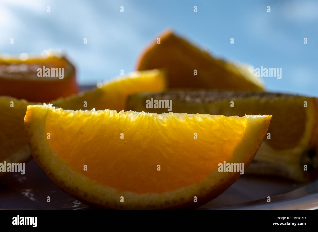 sweet yellow orange slices in easter sunshine Stock Photo - Alamy
