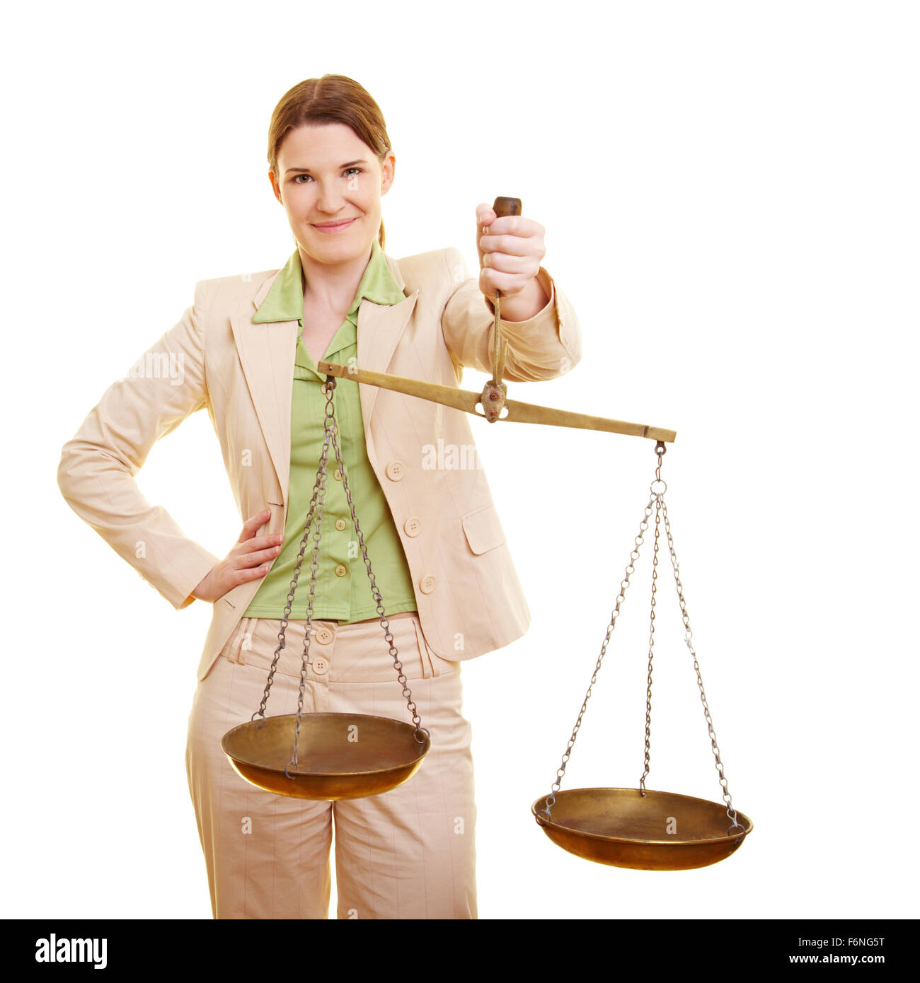 Female judge holding a beam balance in her hand Stock Photo - Alamy