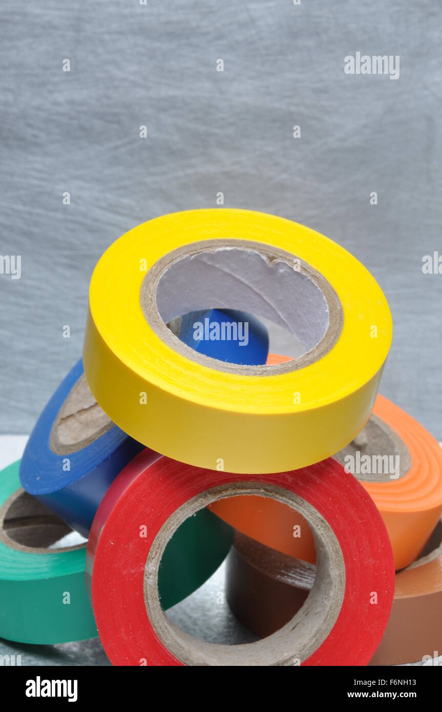 Set of multicolored insulating tapes on metal grey background Stock ...