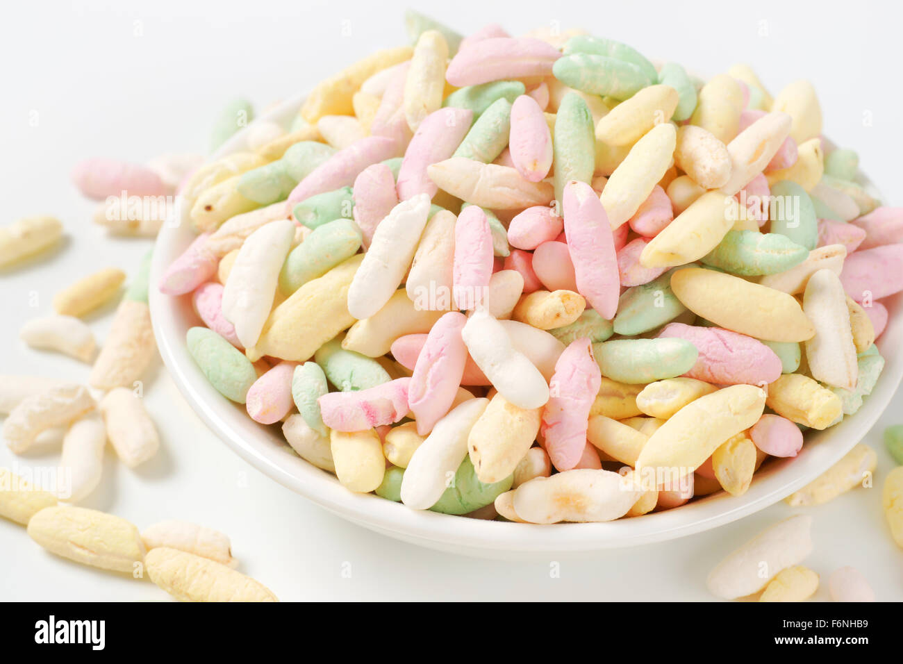 detail of colorful puffed rice in white bowl Stock Photo - Alamy