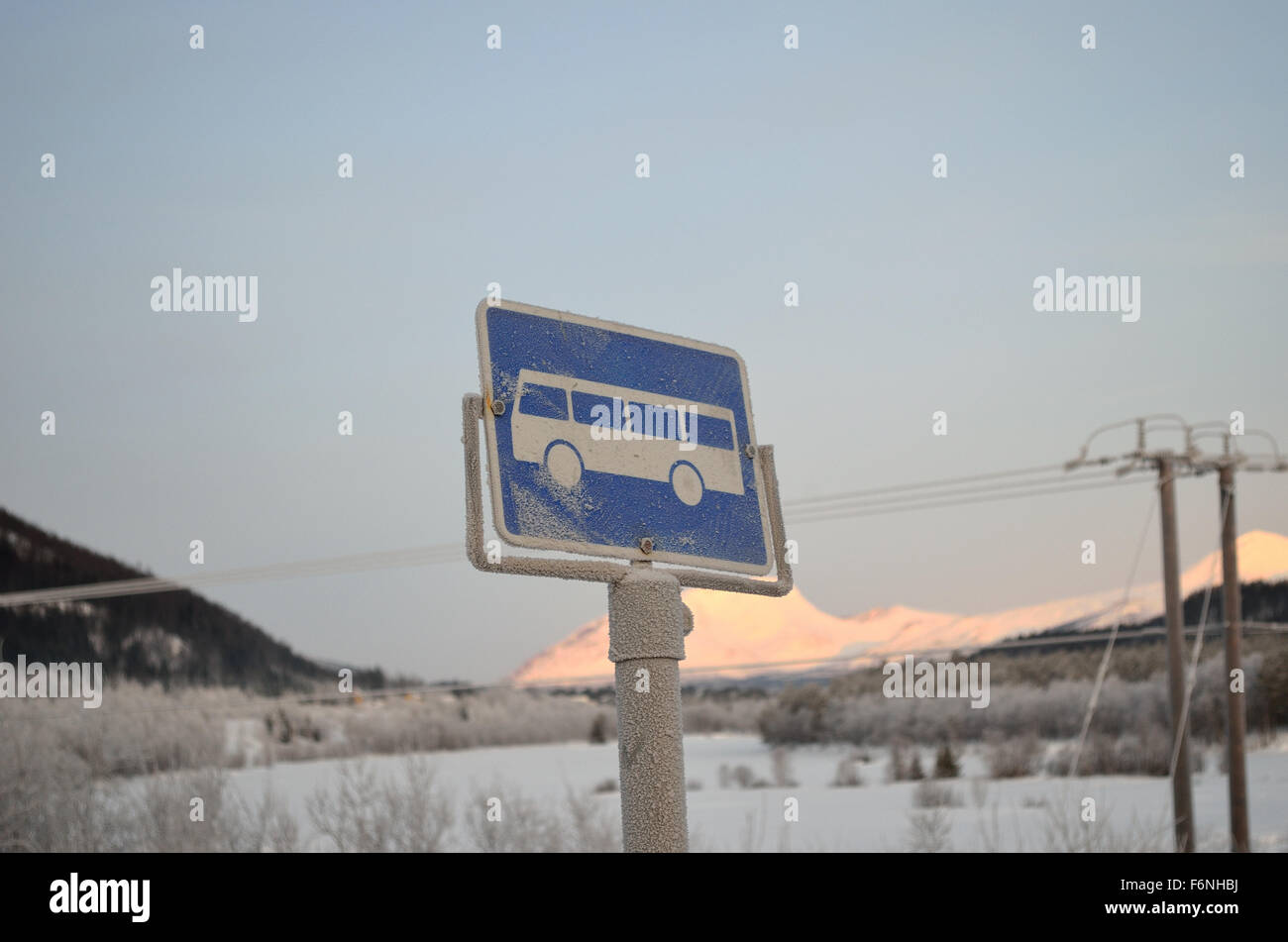 bus stop sign covered with frost Stock Photo - Alamy