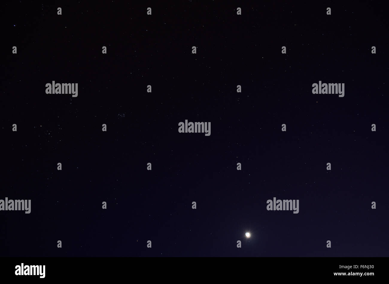 full moon on star filled night sky Stock Photo - Alamy