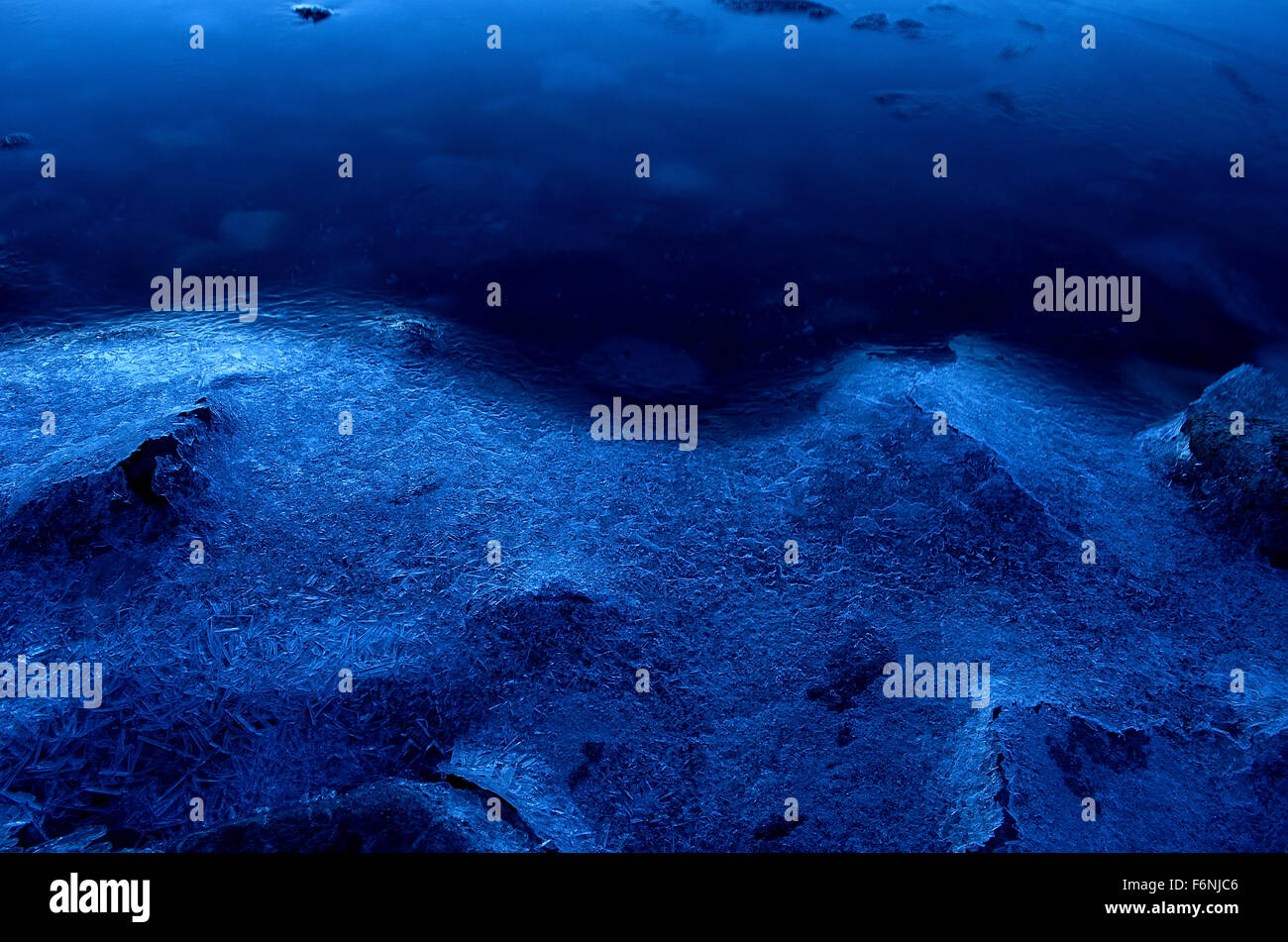 blue ice on sea shore Stock Photo - Alamy