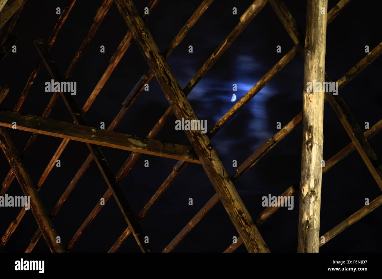 beautiful old illuminated wooden stockfish structure at night time ...
