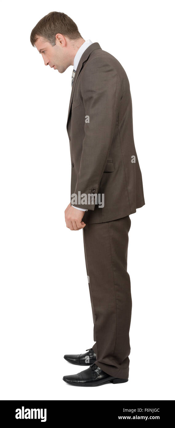 Businessman looking down Stock Photo - Alamy
