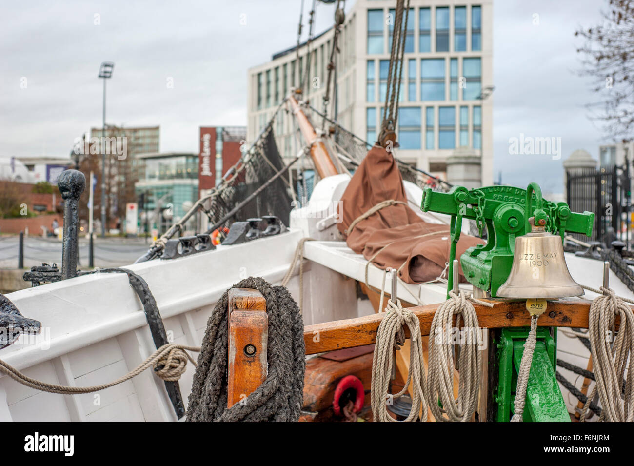 Bow of a tall ship, showing the bowsprit, ropes and a bell, Liverpool ...