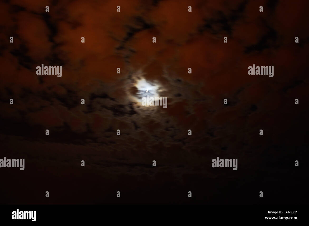 full moon on cloudy night sky Stock Photo - Alamy