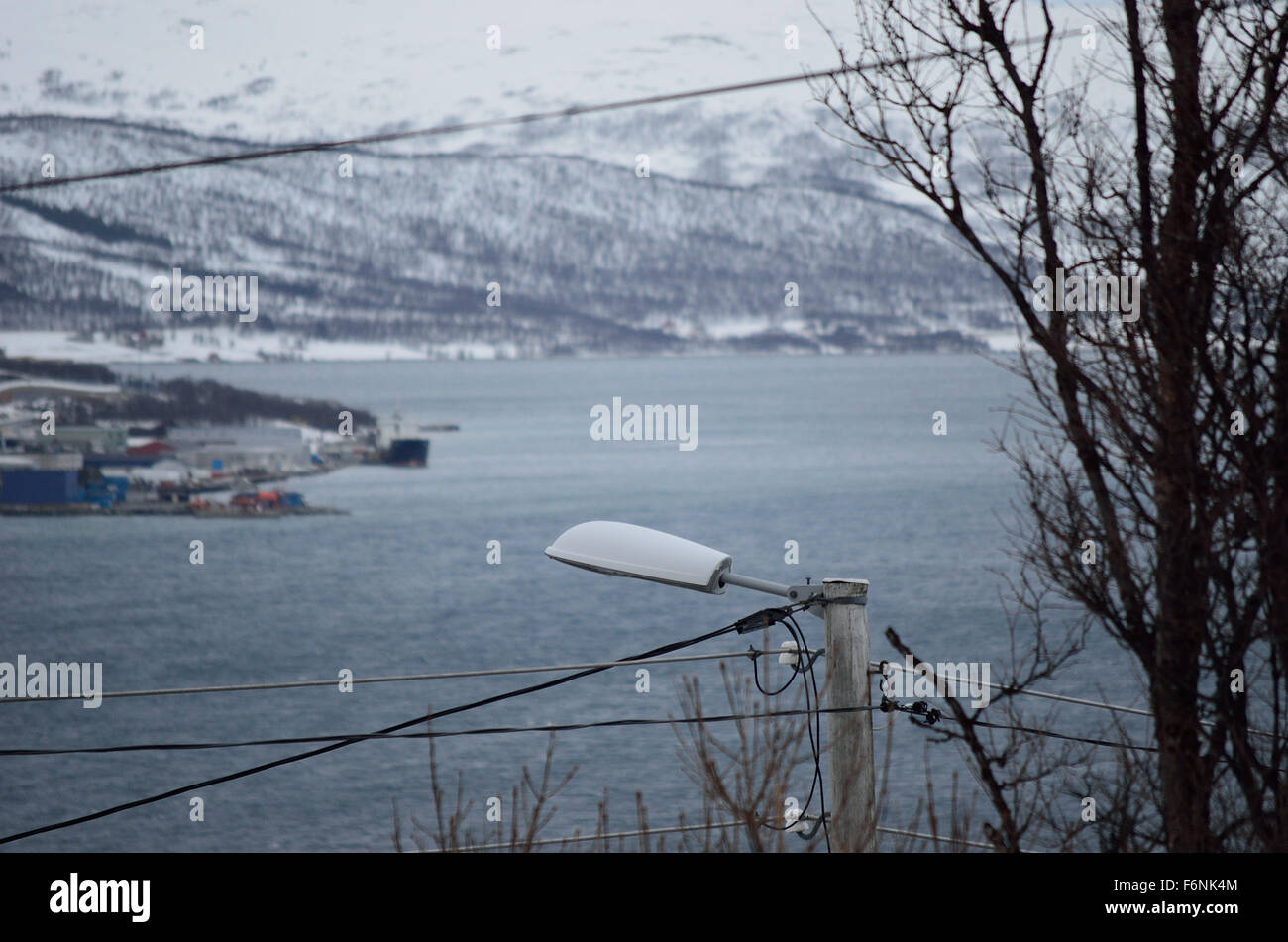 light pole with city and sea background Stock Photo - Alamy
