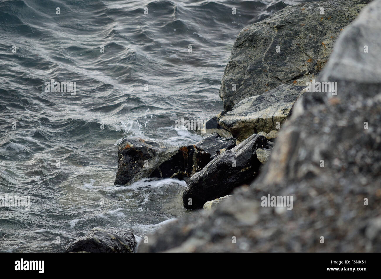 Small wave hitting sea shore hi-res stock photography and images - Alamy