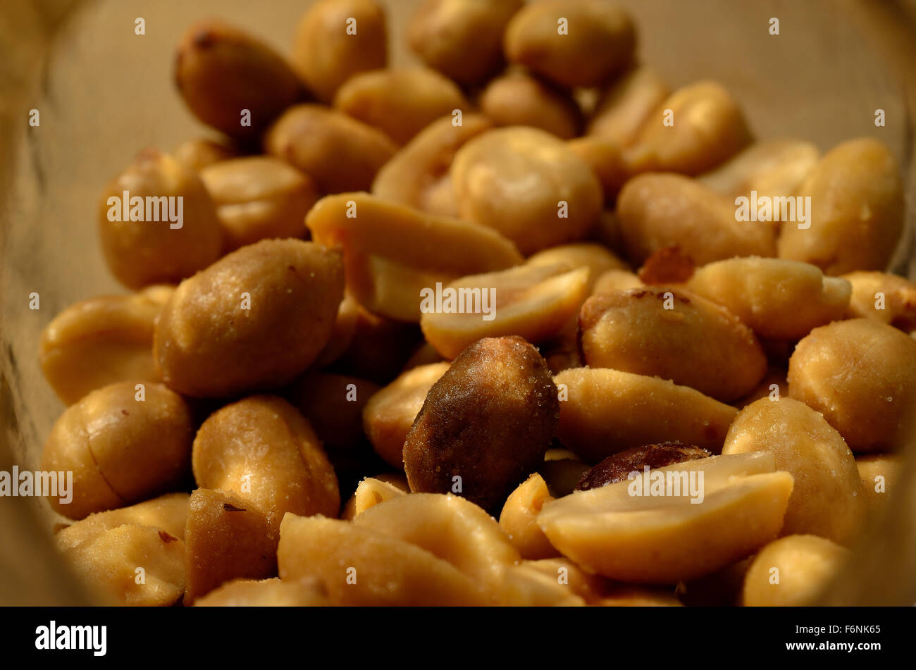 peanuts in glass container close up Stock Photo - Alamy