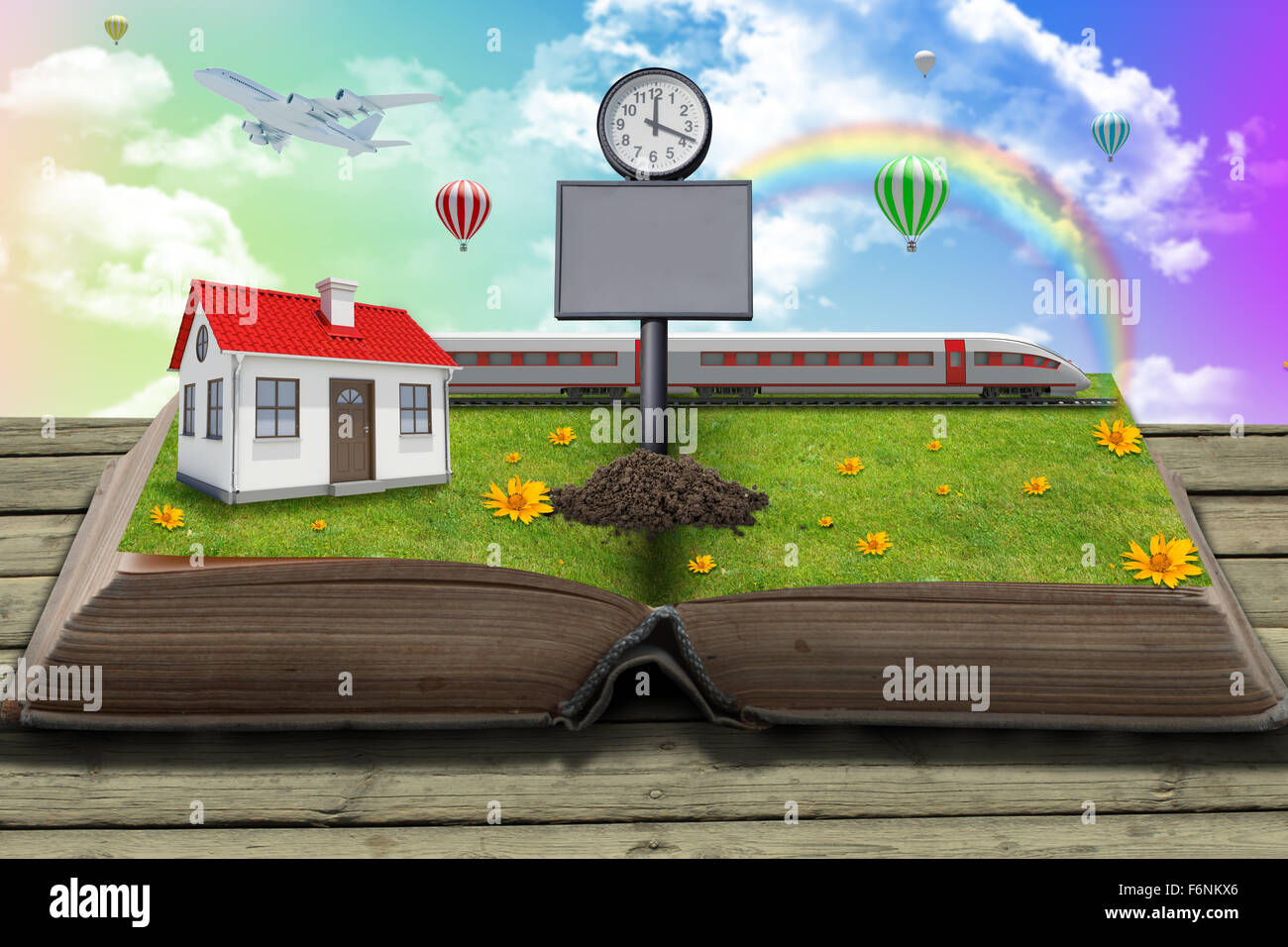 House on open book with grass Stock Photo - Alamy