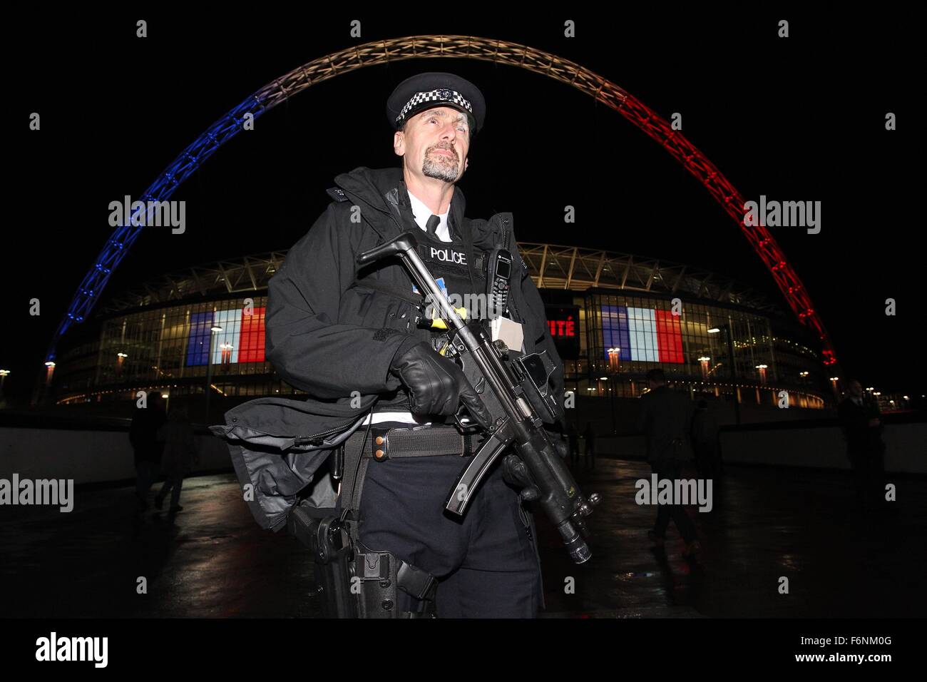 Armed metropolitan MET police patrol outside Wembley Stadium, London ...