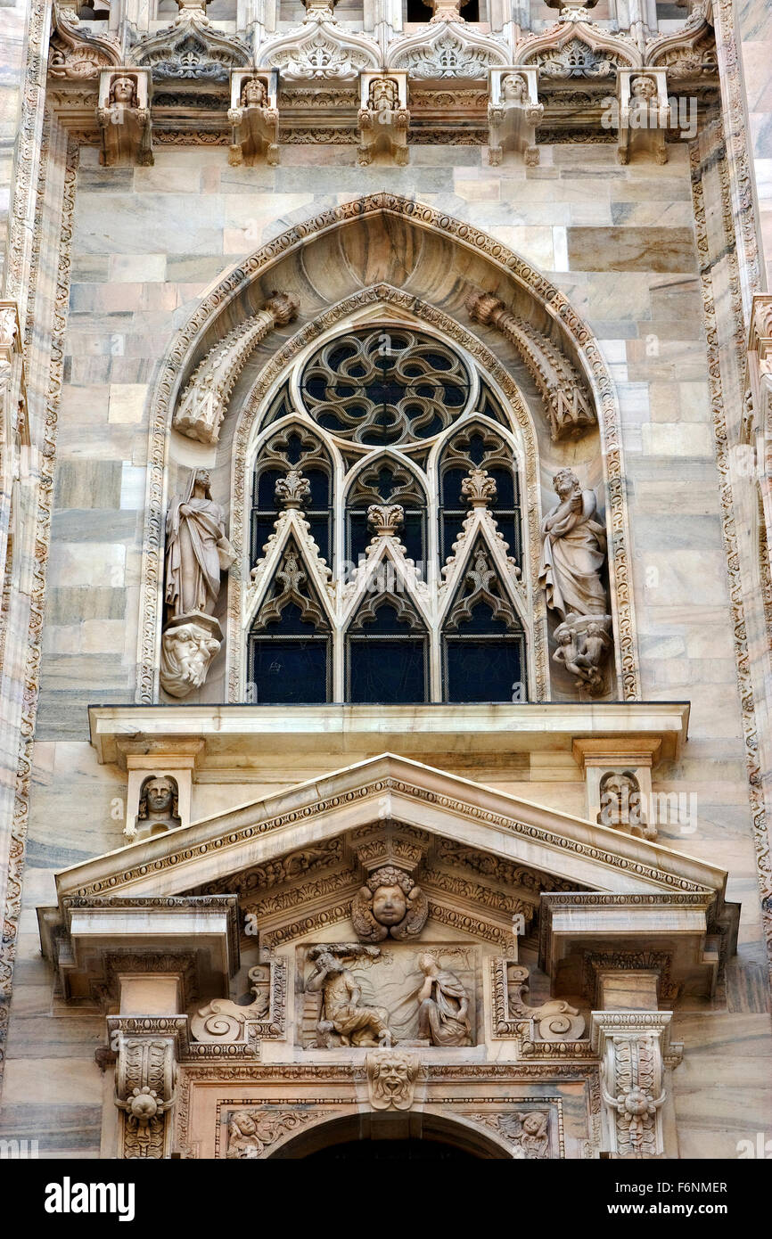 italy statues of a men in the front of the duomo church in milan and ...