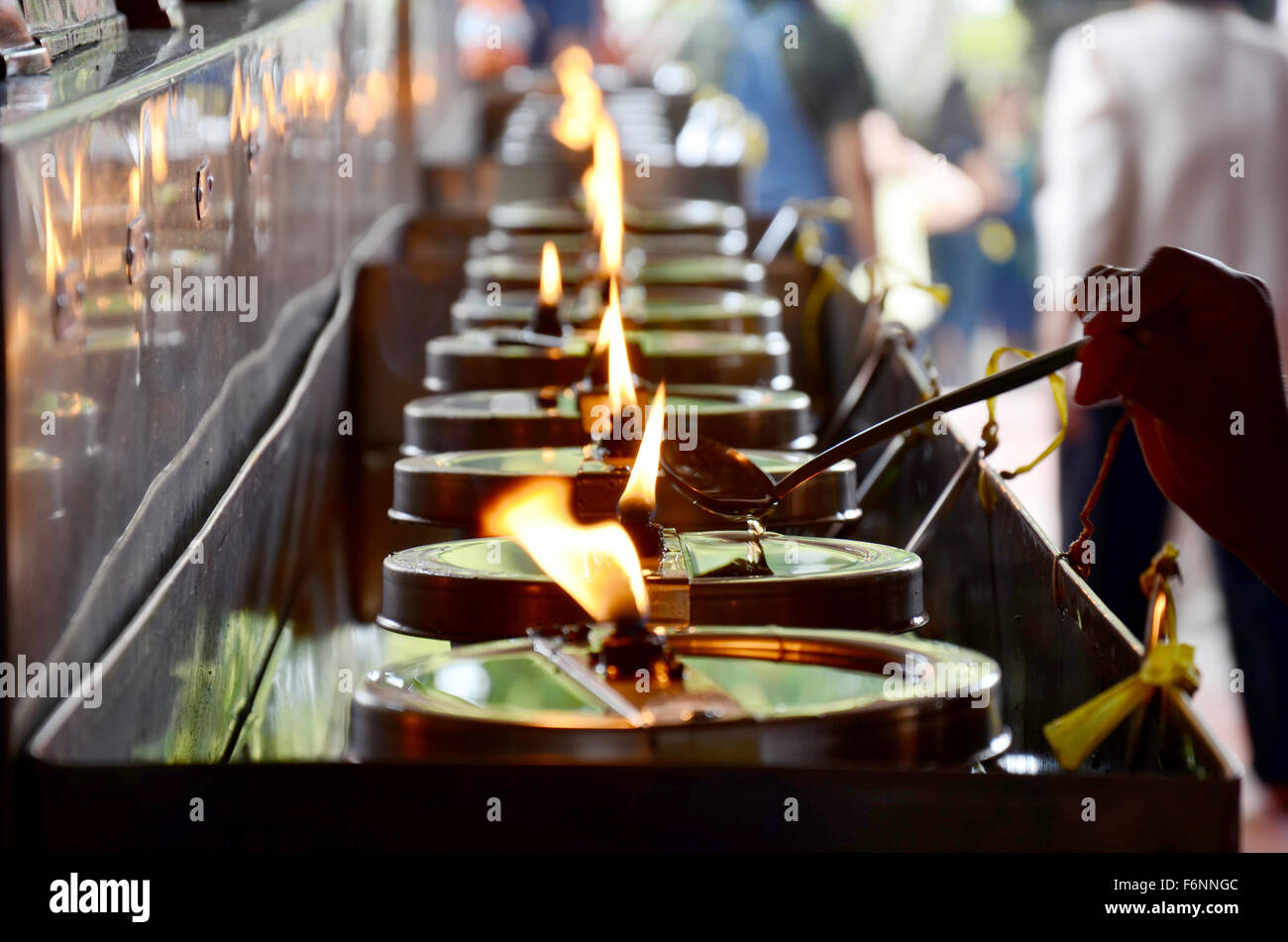 Buddha offering lamps hi-res stock photography and images - Alamy