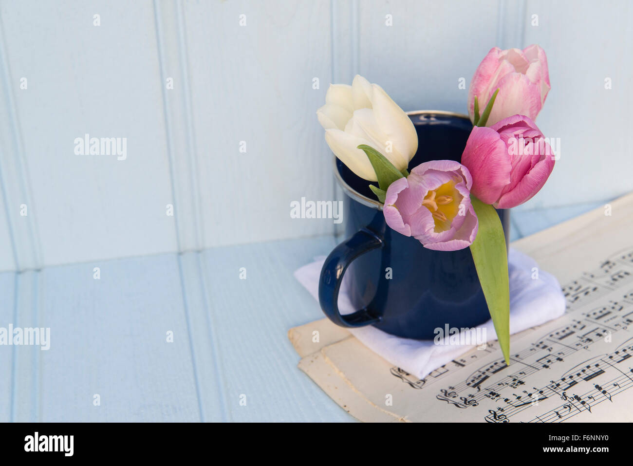 Beautiful Spring flower still life with wooden background Stock Photo ...