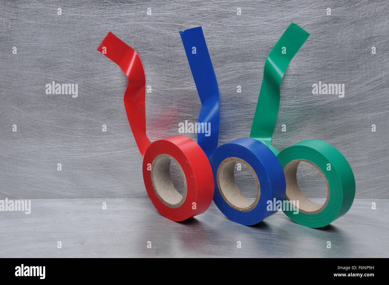 Set of multicolored insulating tapes on metal grey background Stock ...
