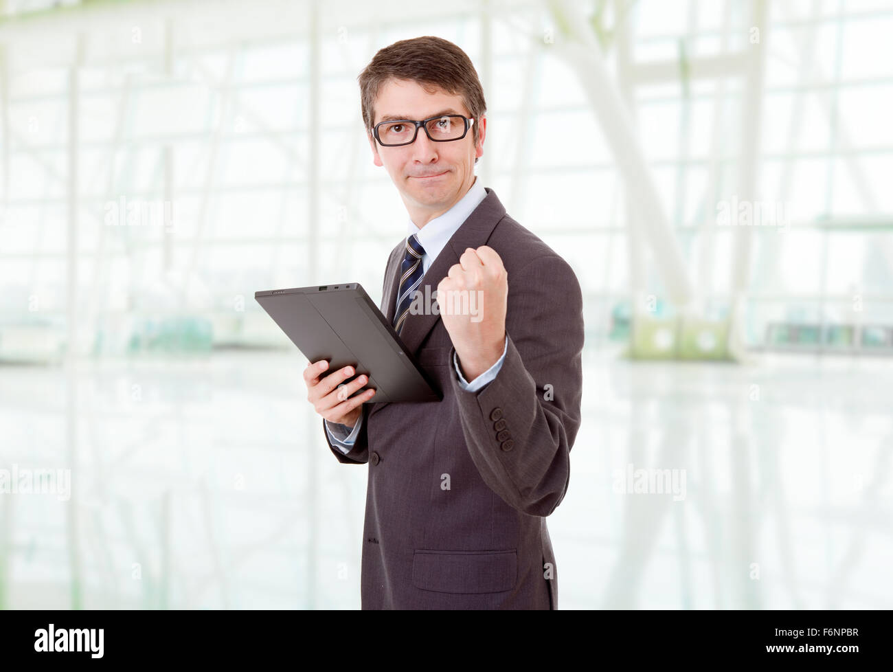 businessman using touch pad of tablet pc, at the office Stock Photo - Alamy